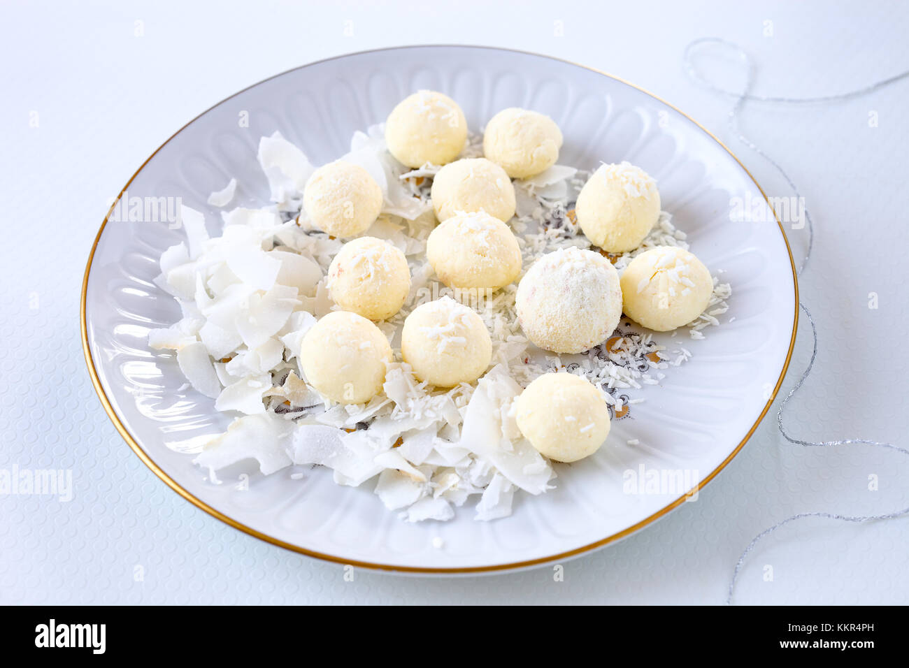 Sweet round coconut spreaded candies Stock Photo - Alamy