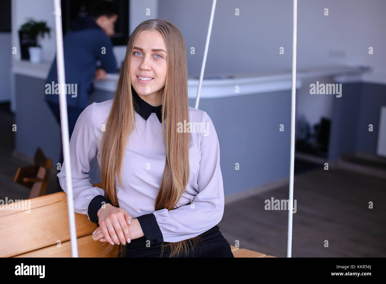 Portrait of cute long-haired successful secretary girl who poses on ...