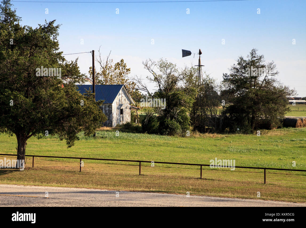 Rustic Texas cattle farm with a tin roof and hay in the fields Stock ...