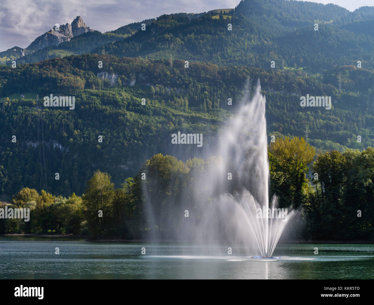 Fountain in the harbour of Seewen Stock Photo - Alamy