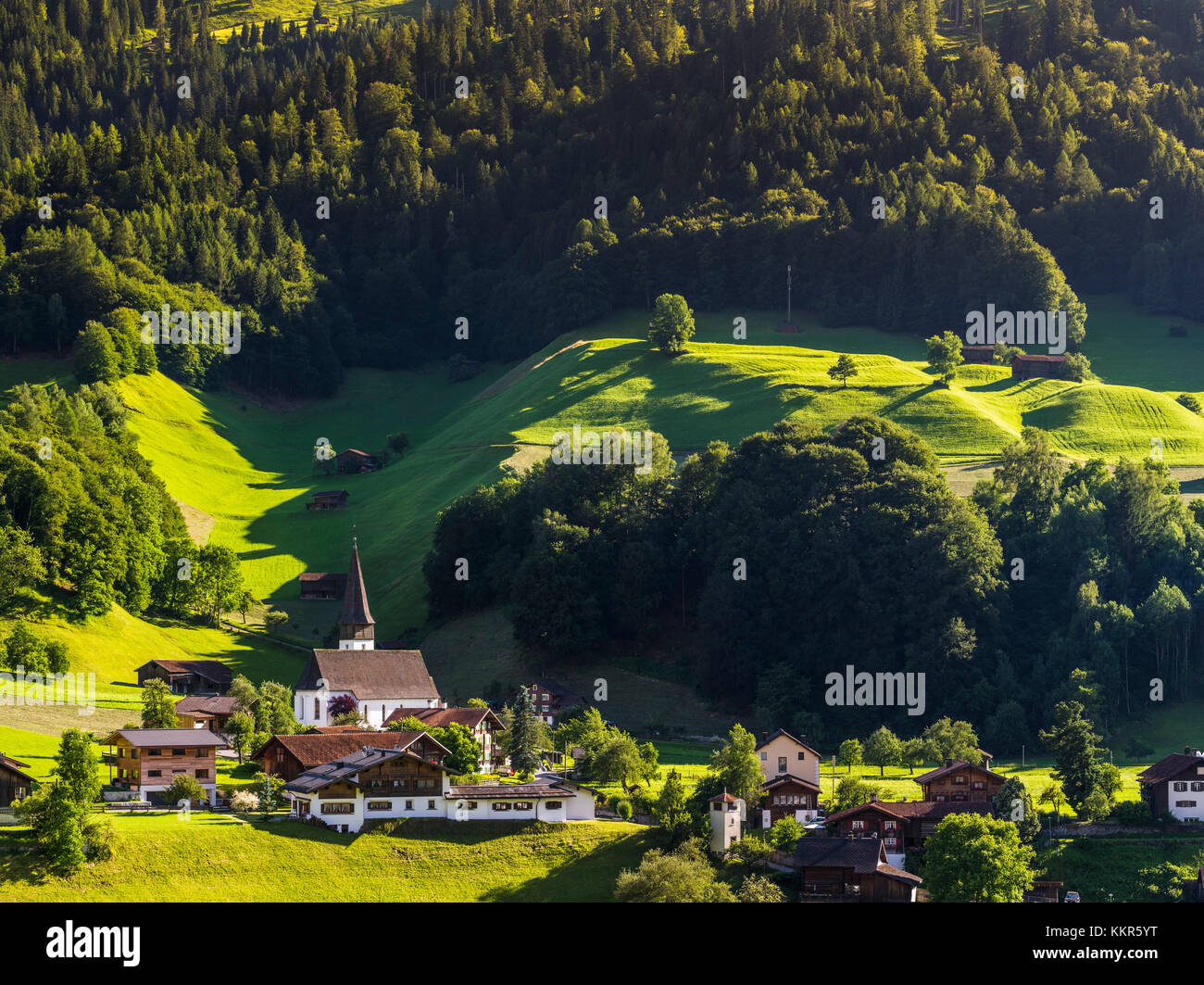 Pragg-Jenaz with church Stock Photo - Alamy