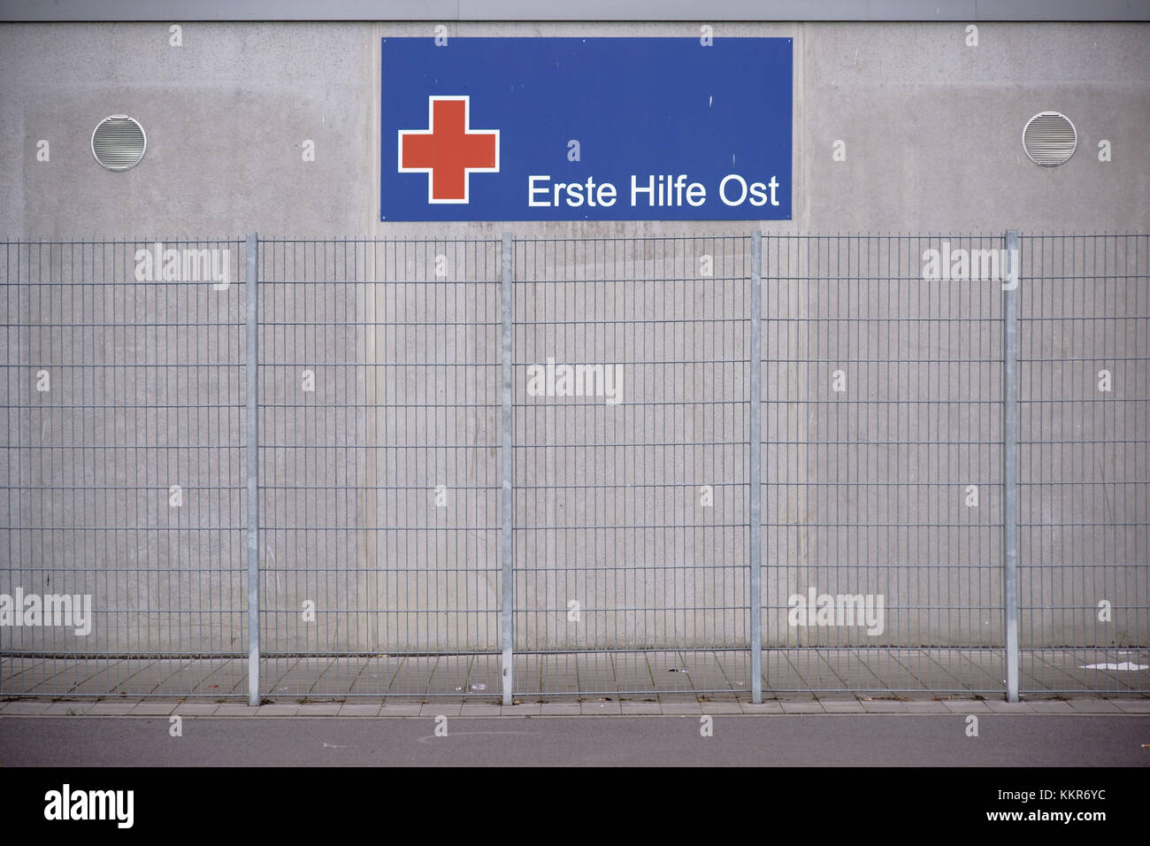 Red Cross, sign for first aid on the exterior facade a stadium Stock ...