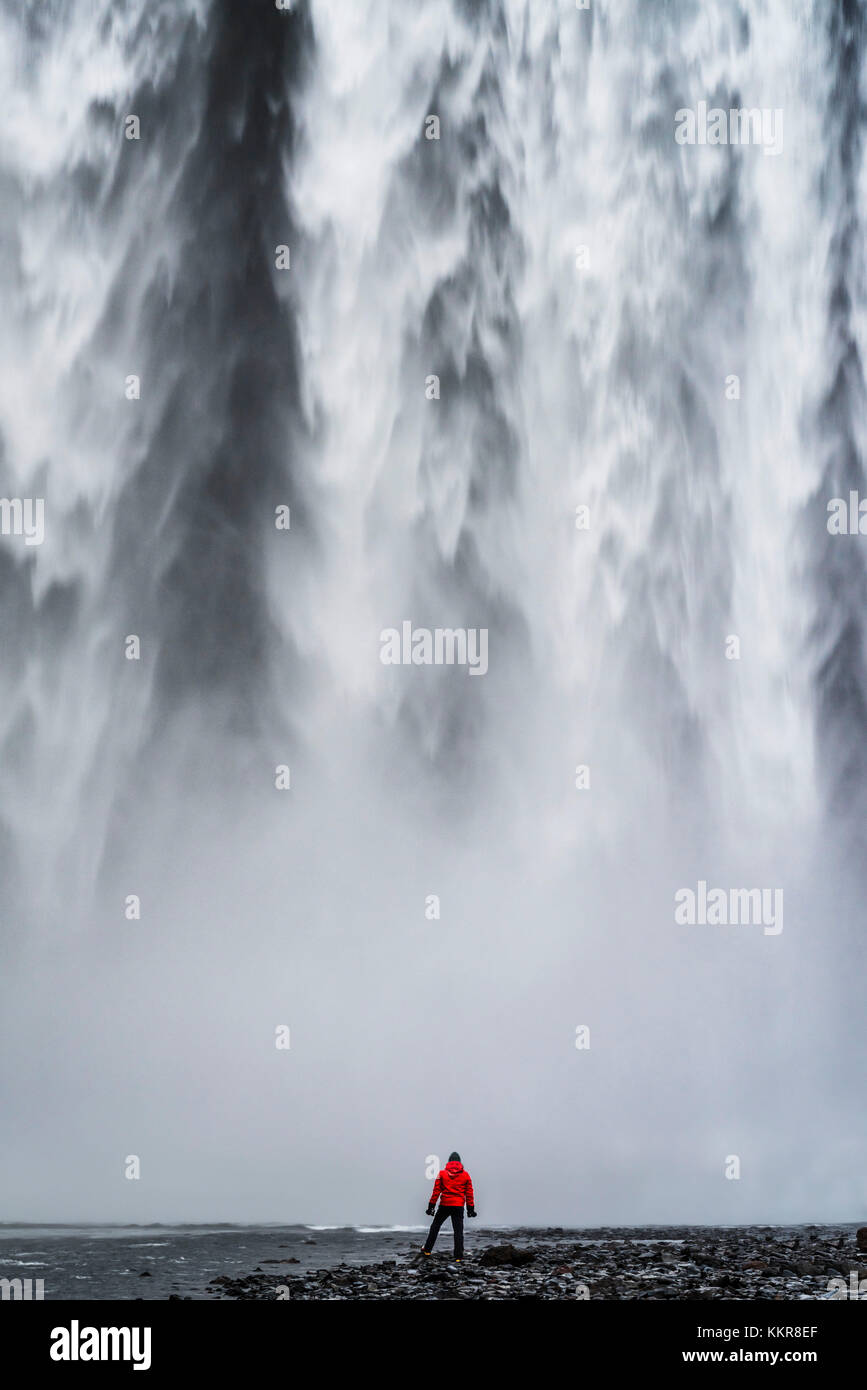 Person under waterfall hi-res stock photography and images - Alamy