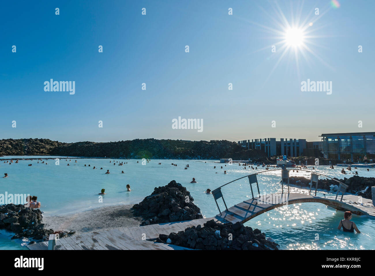 Footbridge at the swimming pool with sun, Blue Lagoon, Iceland Stock ...