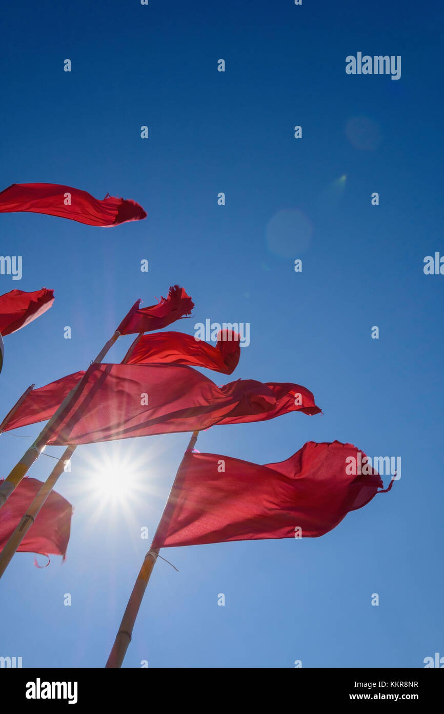 Red marking flags for fishingnets with sun, Hornbaek, Kattegat, Zealand ...