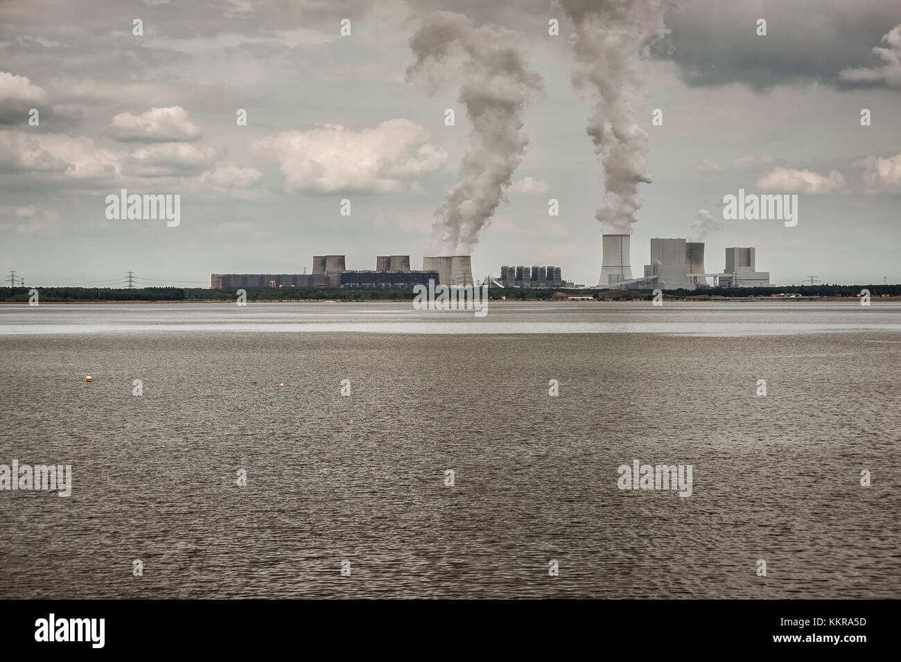 coal-fired power station with columns of steam, columns of smoke Stock ...
