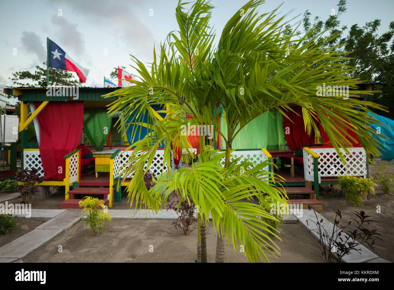 St. Kitts and Nevis, Nevis, Pinneys Beach, beach lounge with curtains ...
