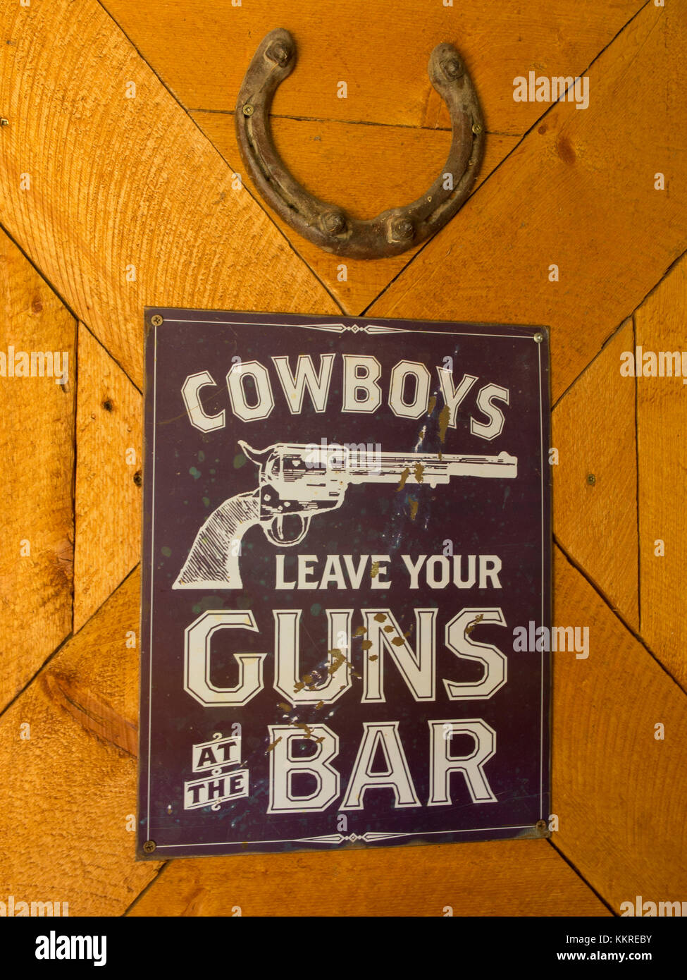 saloon gun sign Stock Photo - Alamy