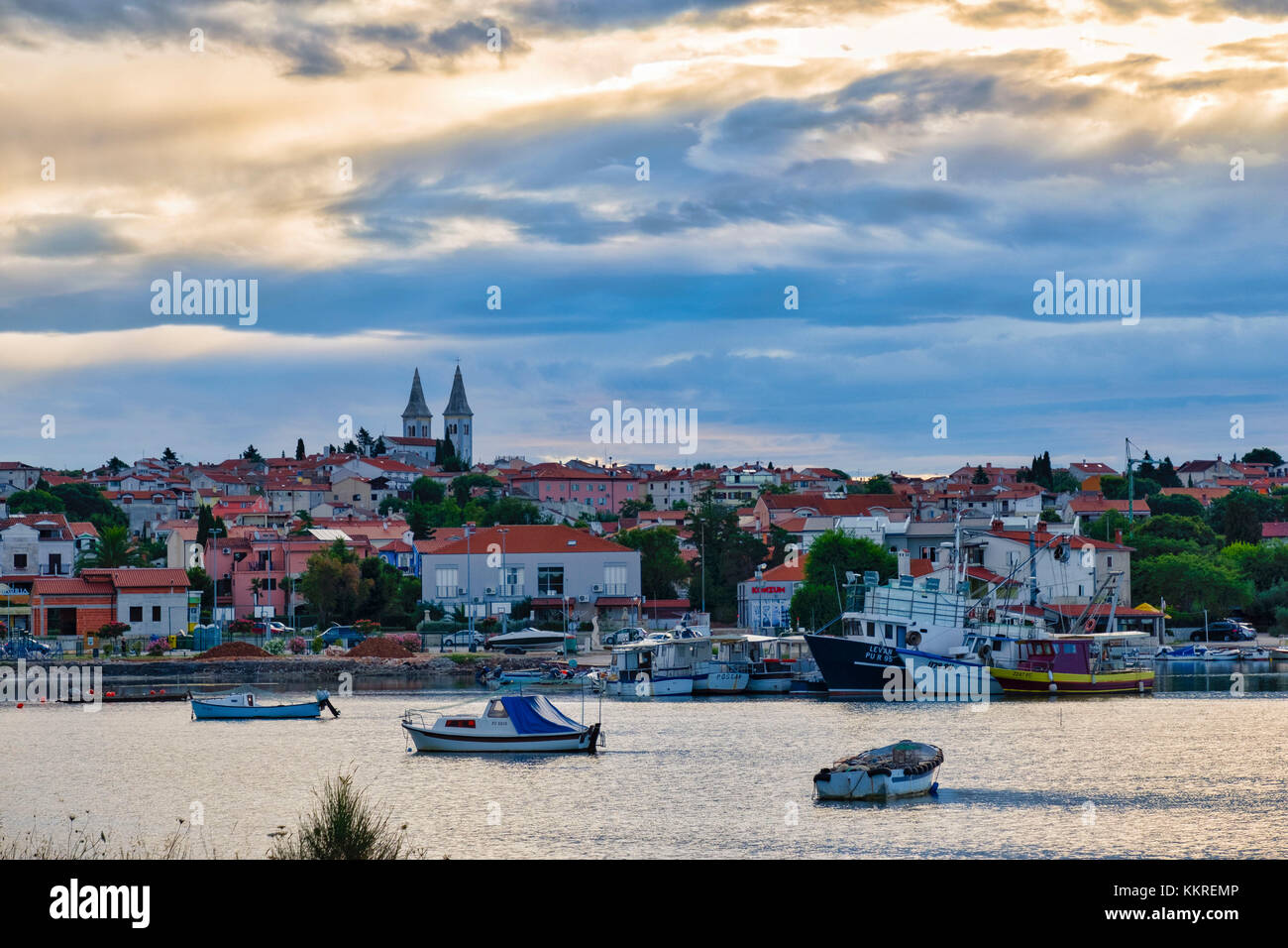 Croatia, Istria, Medulin, The old town and its harbor at sunrise Stock ...