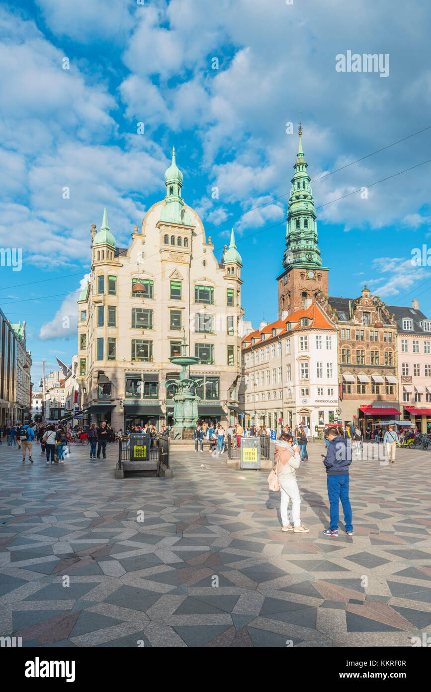 Copenhagen, Hovedstaden, Denmark. Tourists and bars in Amager square ...