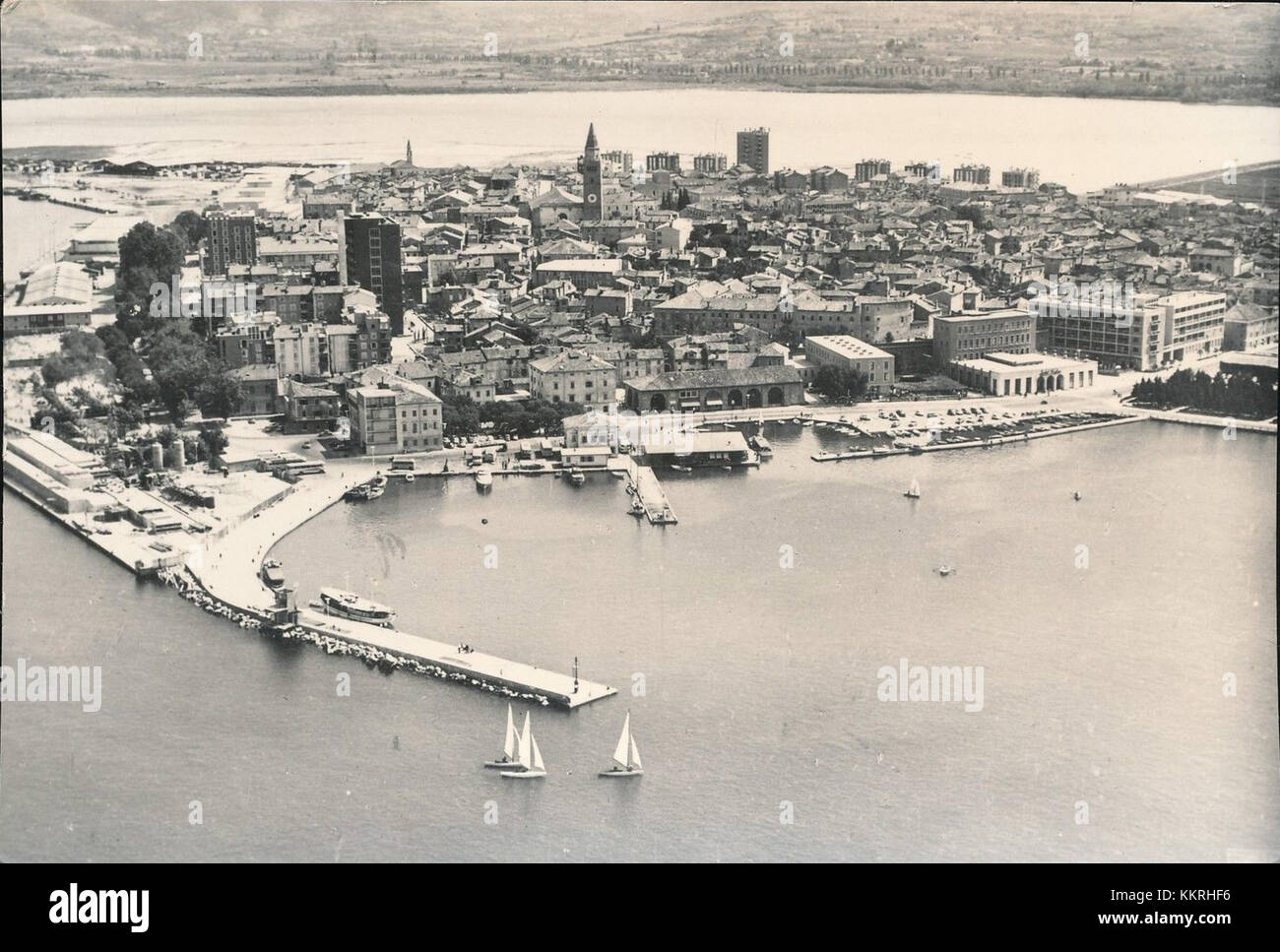 A postcard depicting panoramic views of Koper, a coastal town in ...