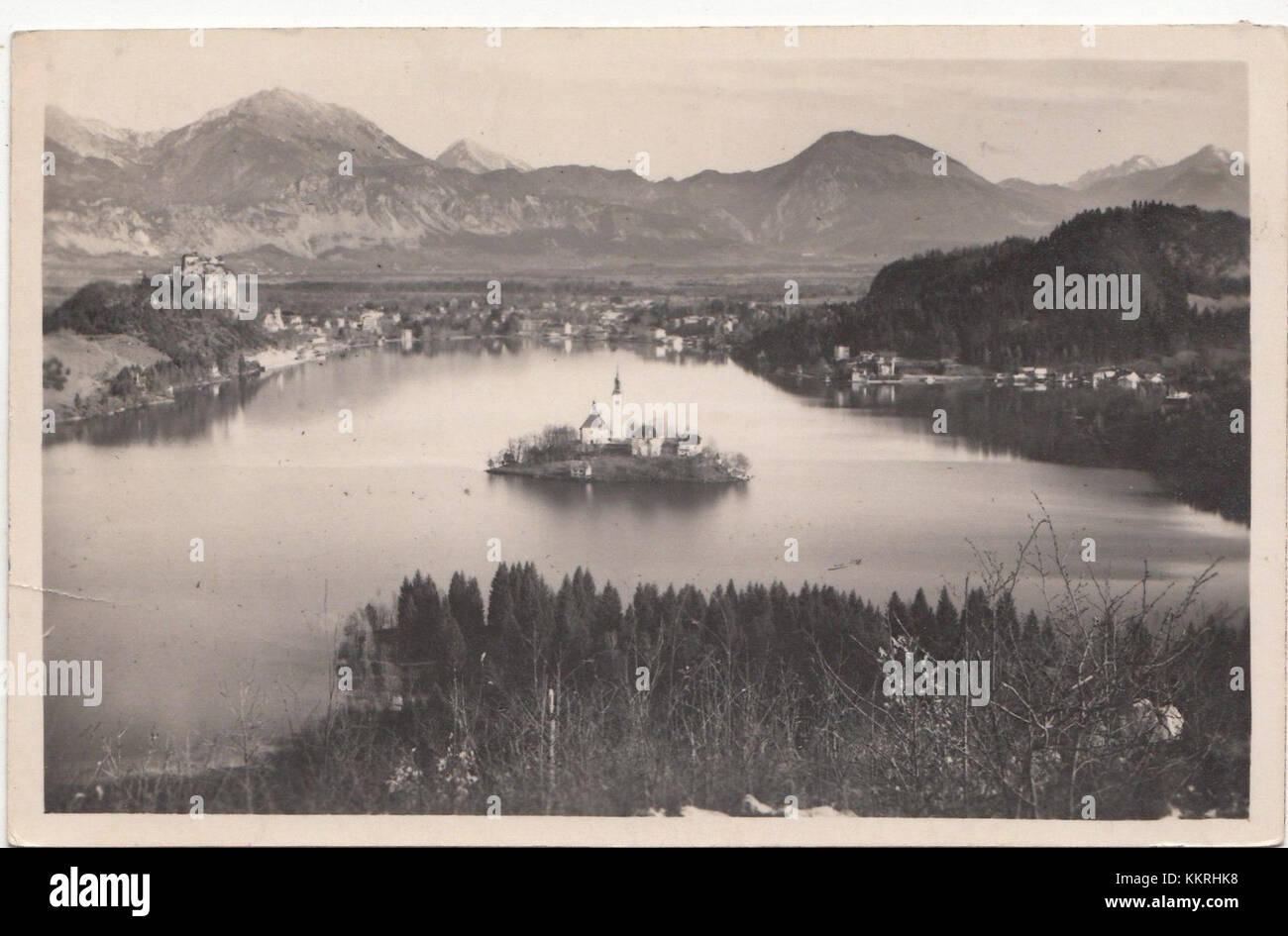 A postcard from 1932 depicts the picturesque town of Bled in Slovenia ...