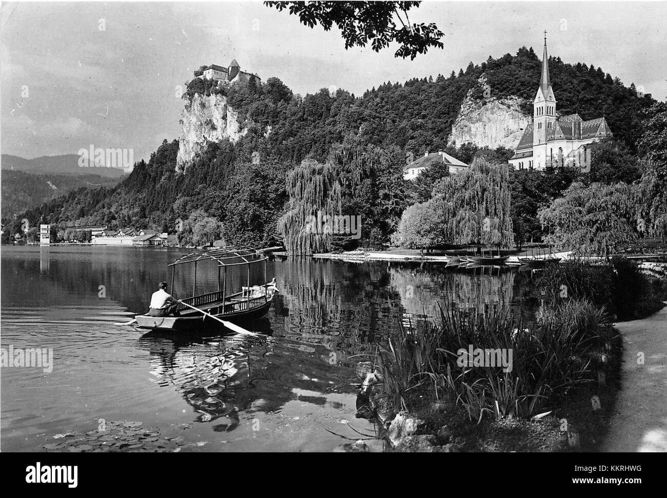 This postcard from 1957 depicts Bled, a scenic town in Slovenia. Known ...