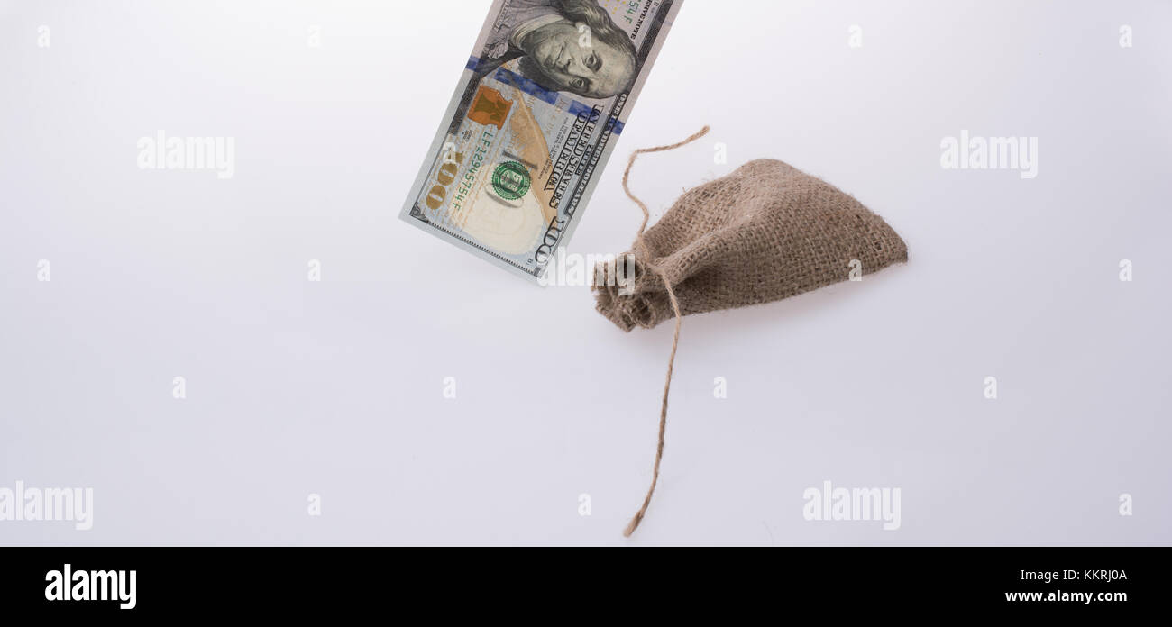 Banknote of US dollar hanging on a linen string Stock Photo - Alamy
