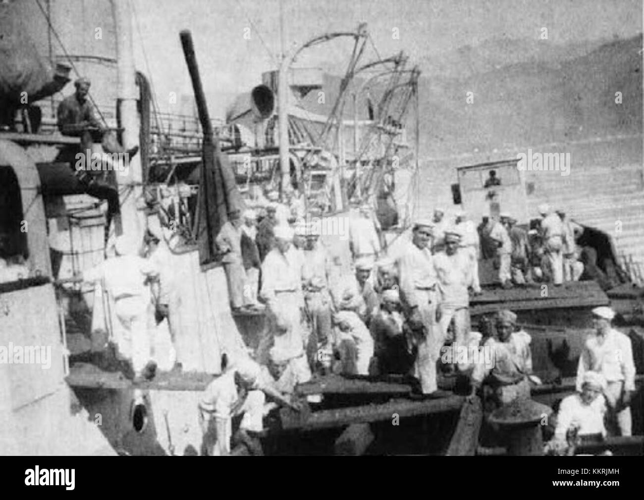 The image depicts coal loading onto the ship Dalmacija. This is a ...