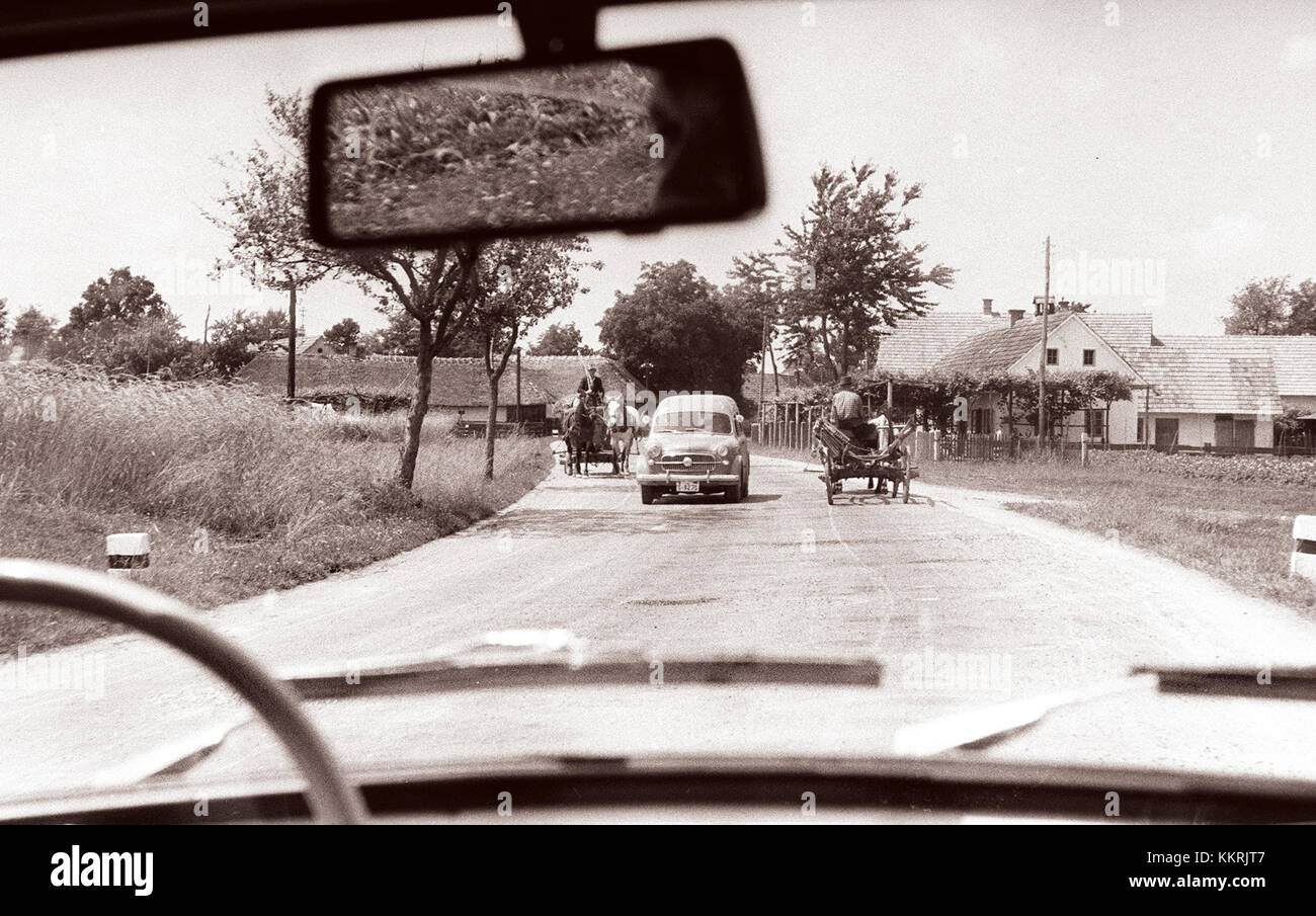 This 1961 photograph captures a scene along the second-class road from ...