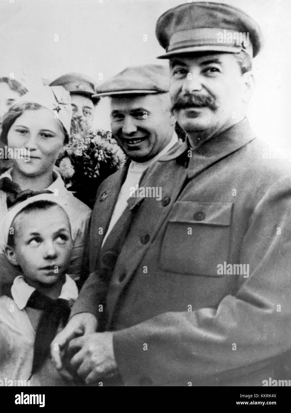 A historical photograph from the 1930s depicting Joseph Stalin and ...