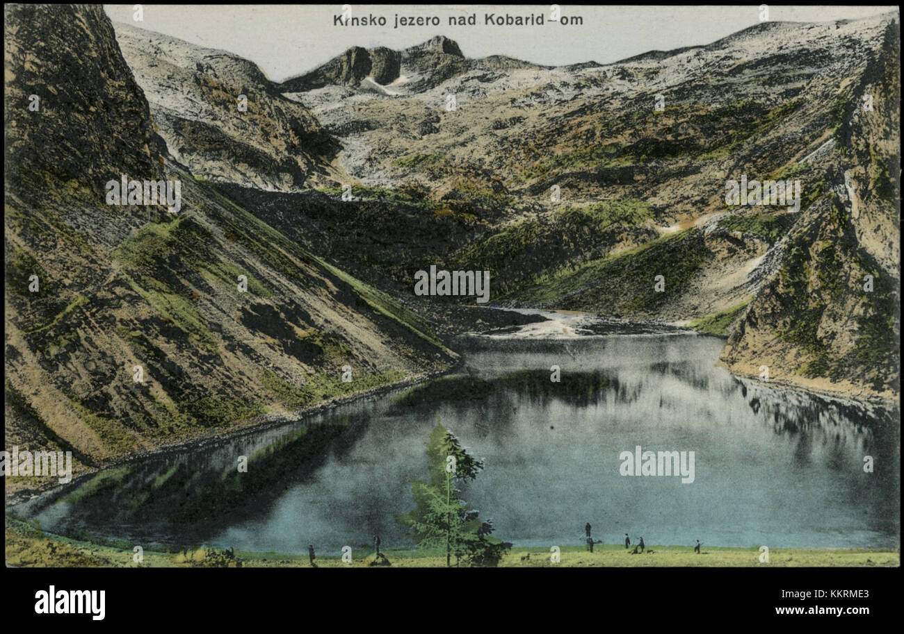 A postcard featuring Lake Krn, a scenic alpine lake located in Slovenia ...