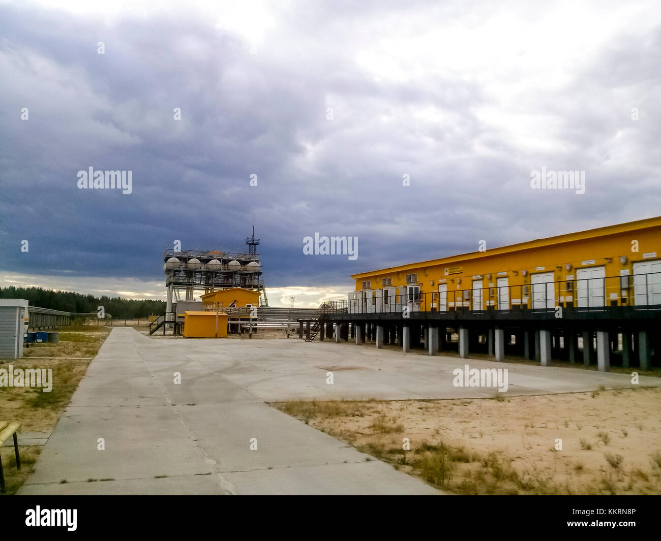 Yellow building - Oil pumping station for oil pumping. Oilfield ...