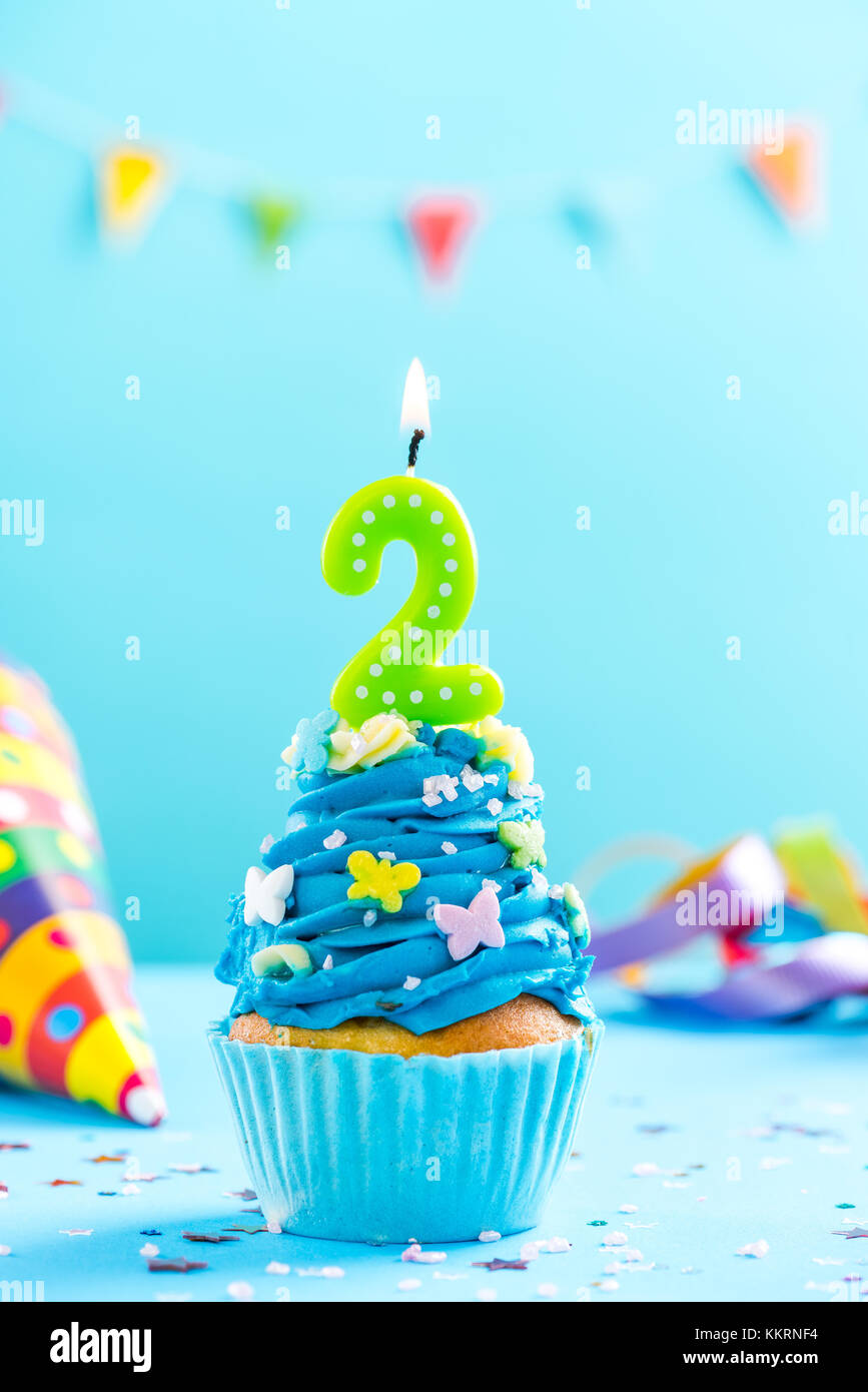 Second 2nd birthday cupcake with candle and sprinkles. Card mockup ...