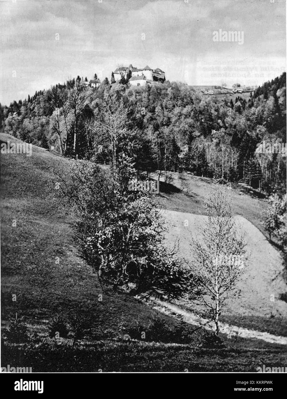 A spring view of Turjak Castle, captured in 1929, shows the historical ...