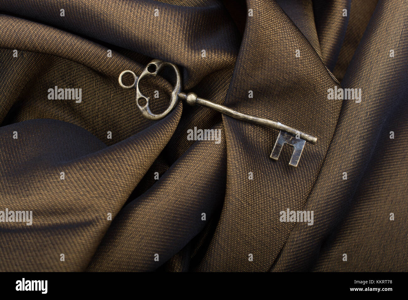 Retro styled color decorativel key place on fabric Stock Photo - Alamy