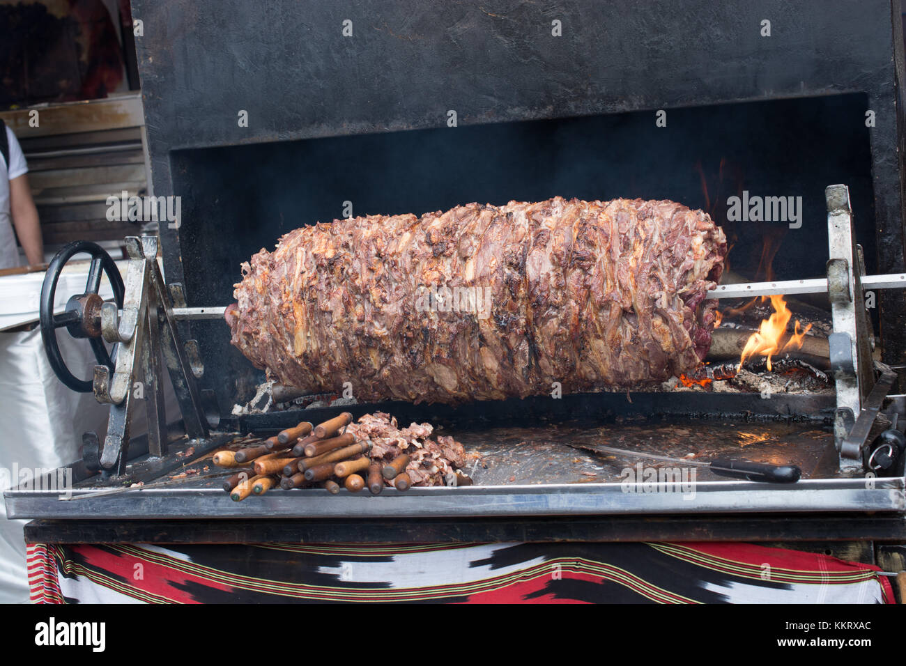 Turkish cag Kebab on pole in horizontal position Stock Photo - Alamy