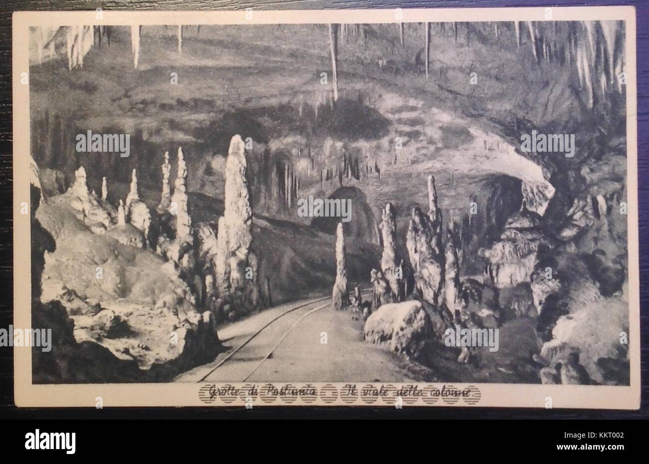 A 1930s postcard of Postojna Cave in Slovenia shows the natural beauty ...