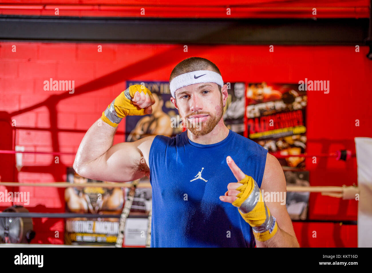 An amateur boxer poses after a sparring session at the gym Stock Photo ...