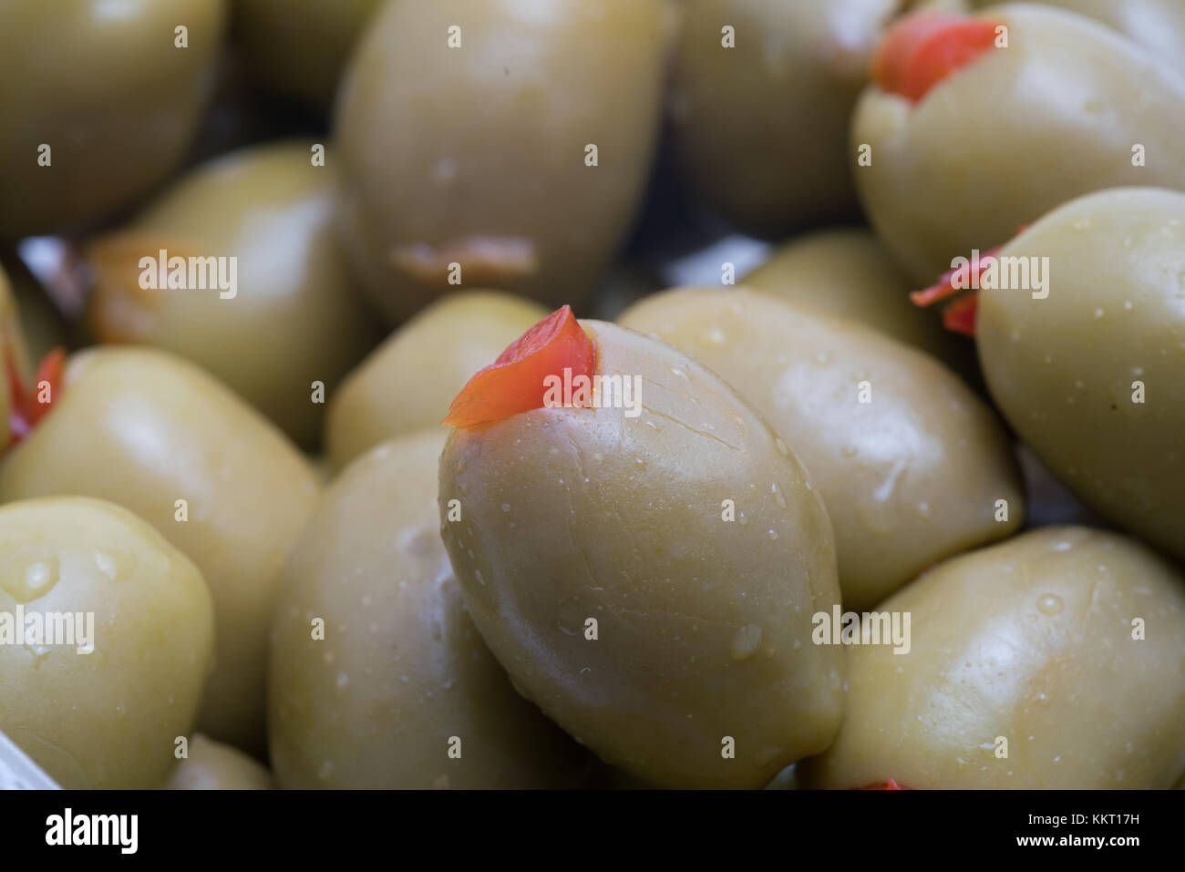 Fresh Green Olives with red Pepper, Close Up Macro shot Stock Photo - Alamy