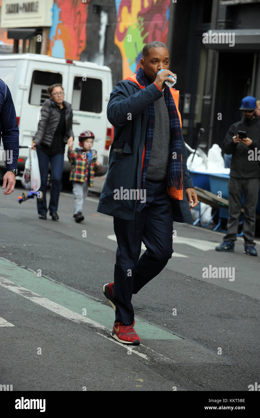NEW YORK, NEW YORK - MARCH 31: Actor Will Smith rides a bike on the set ...