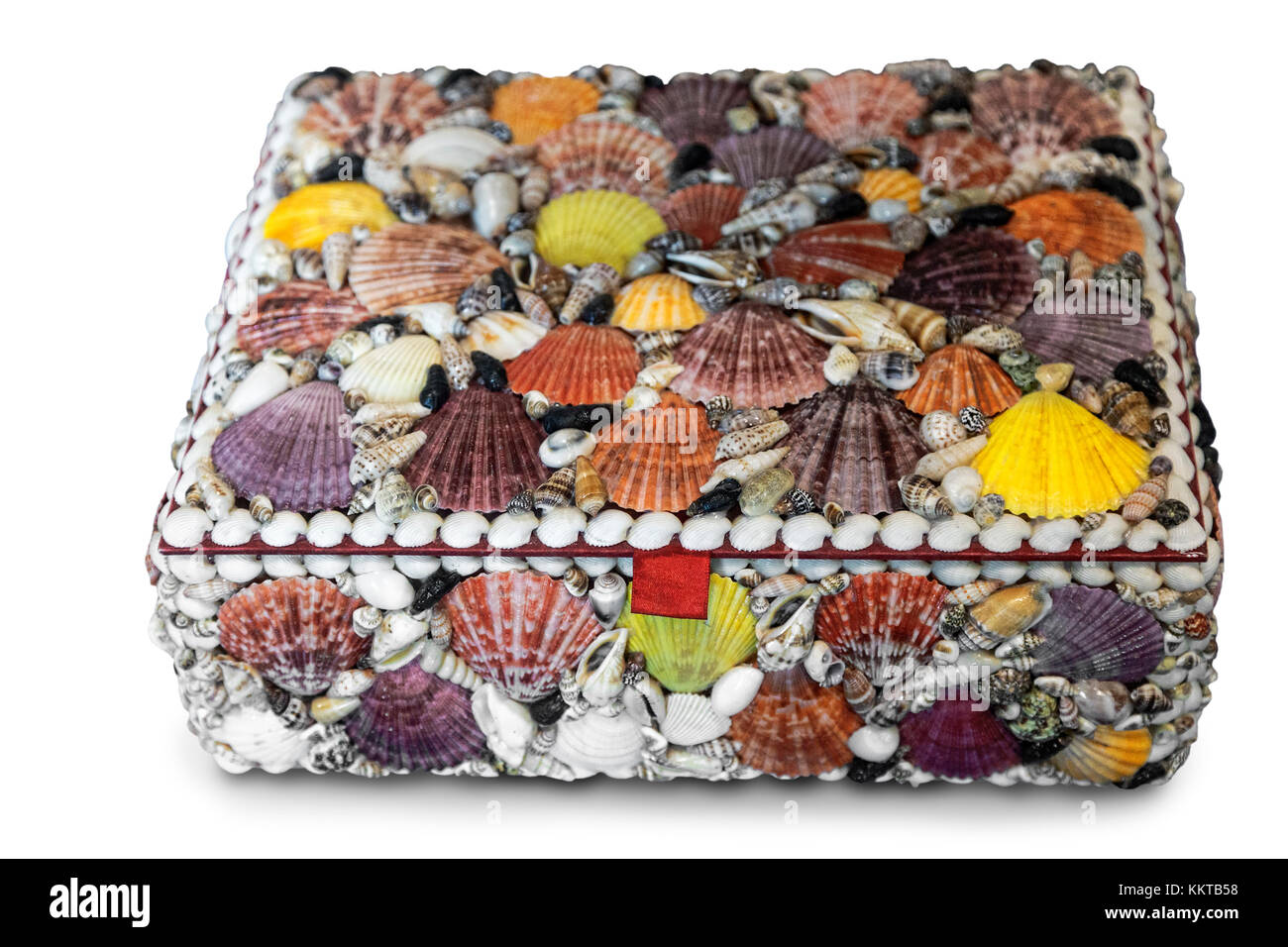 Beautiful decorative box decorated with sea shells of different colors. Presented on a white ...