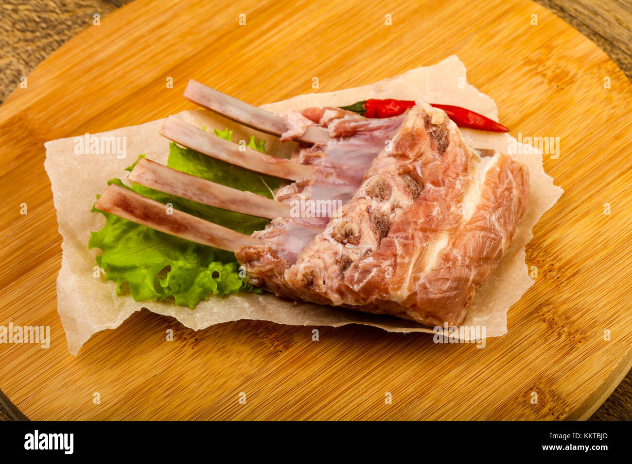 Raw lamb ribs with pepper ready for cooking Stock Photo - Alamy