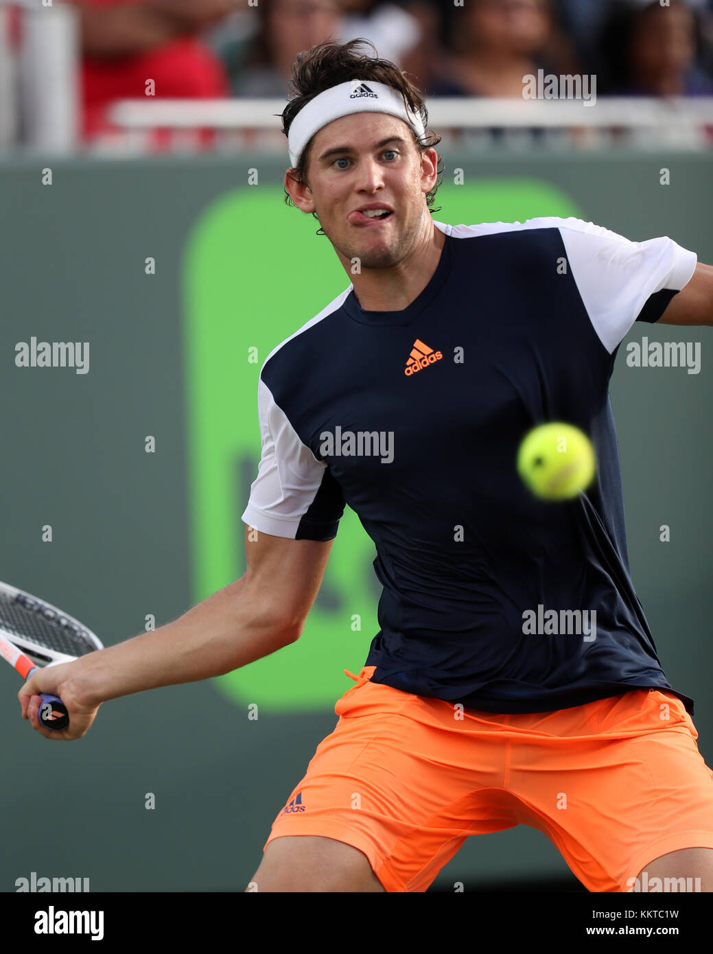 KEY BISCAYNE, FL - MARCH 25: Dominic Thiem breaks his racket on day 6 ...