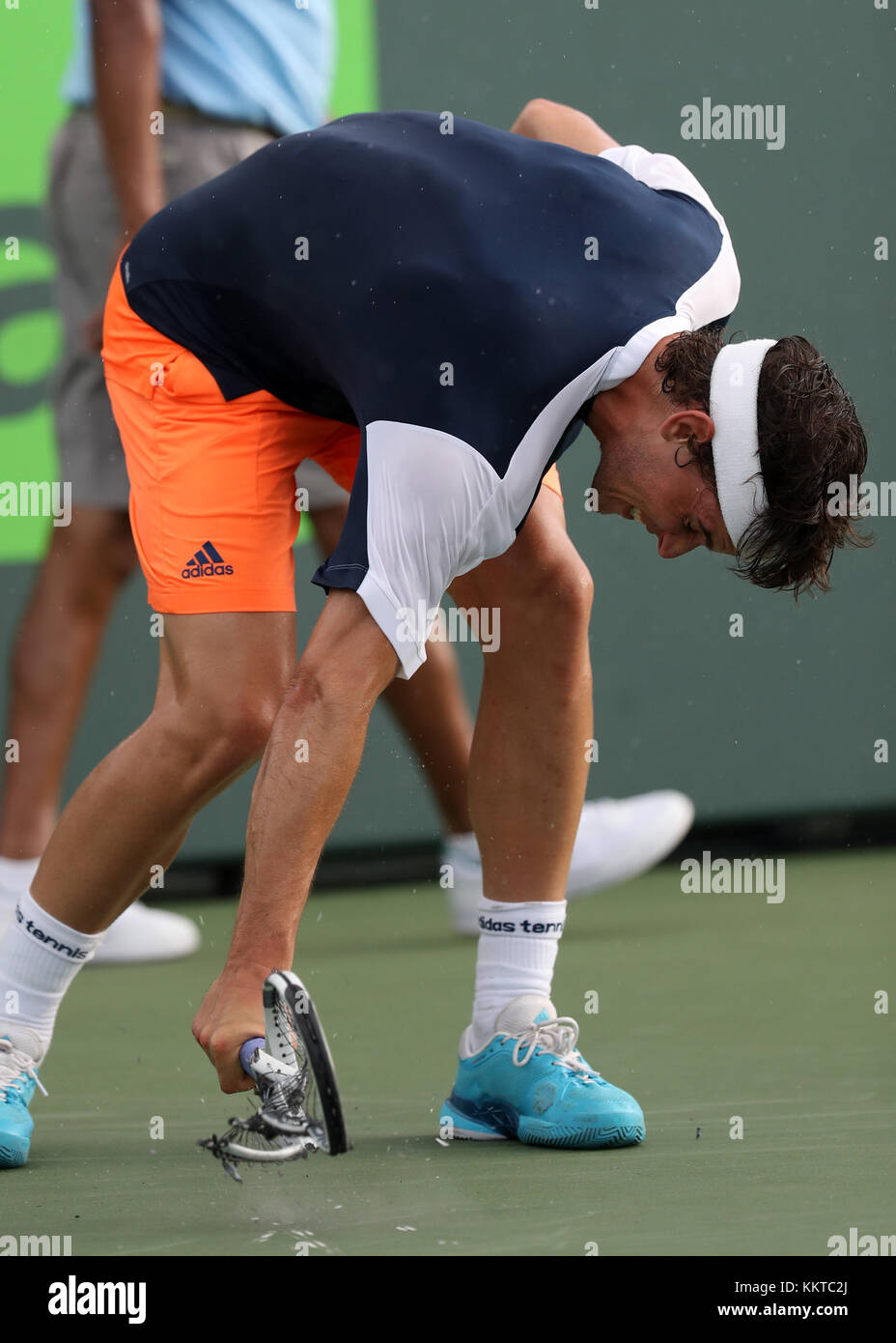 KEY BISCAYNE, FL - MARCH 25: Dominic Thiem breaks his racket on day 6 ...