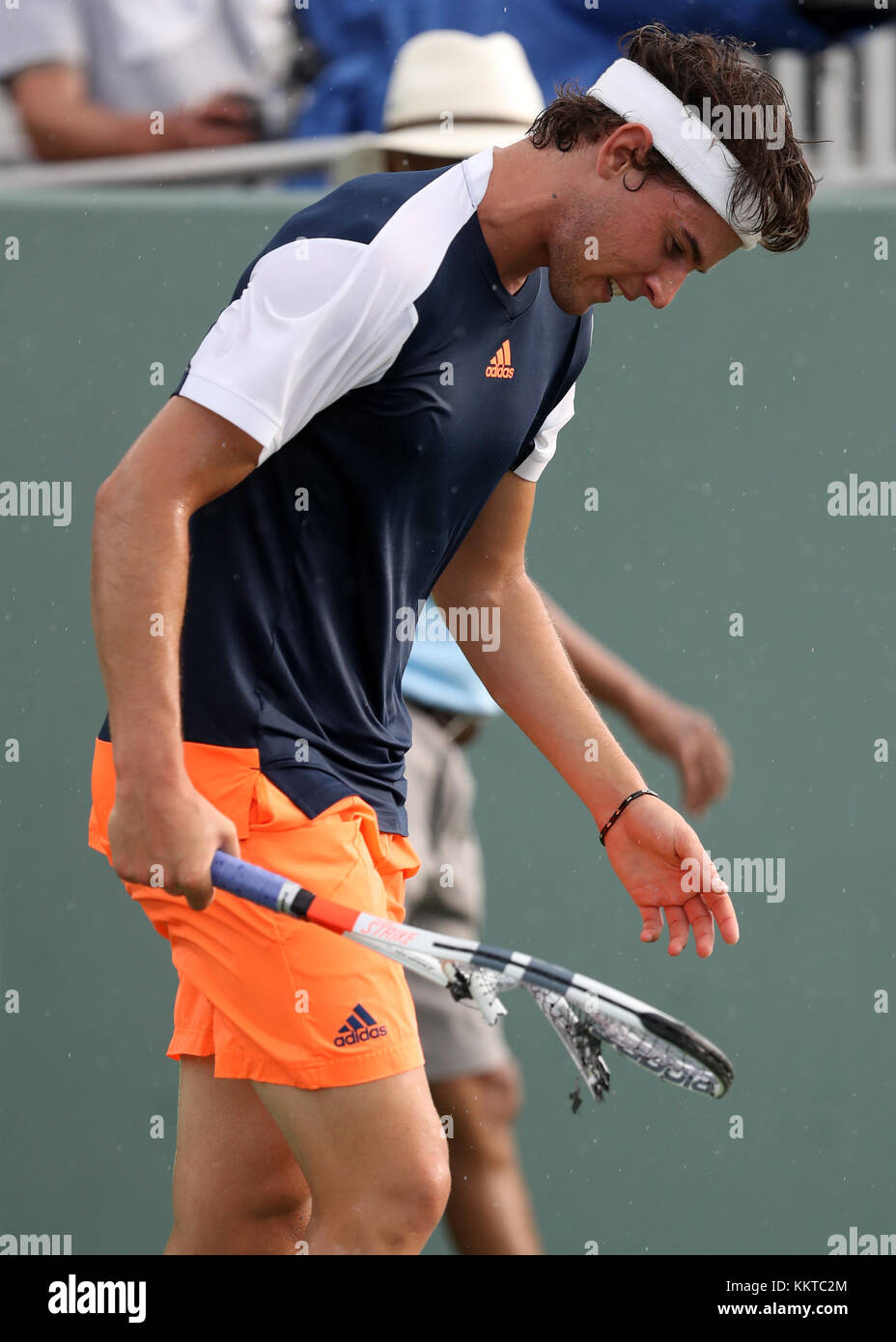 KEY BISCAYNE, FL - MARCH 25: Dominic Thiem breaks his racket on day 6 ...