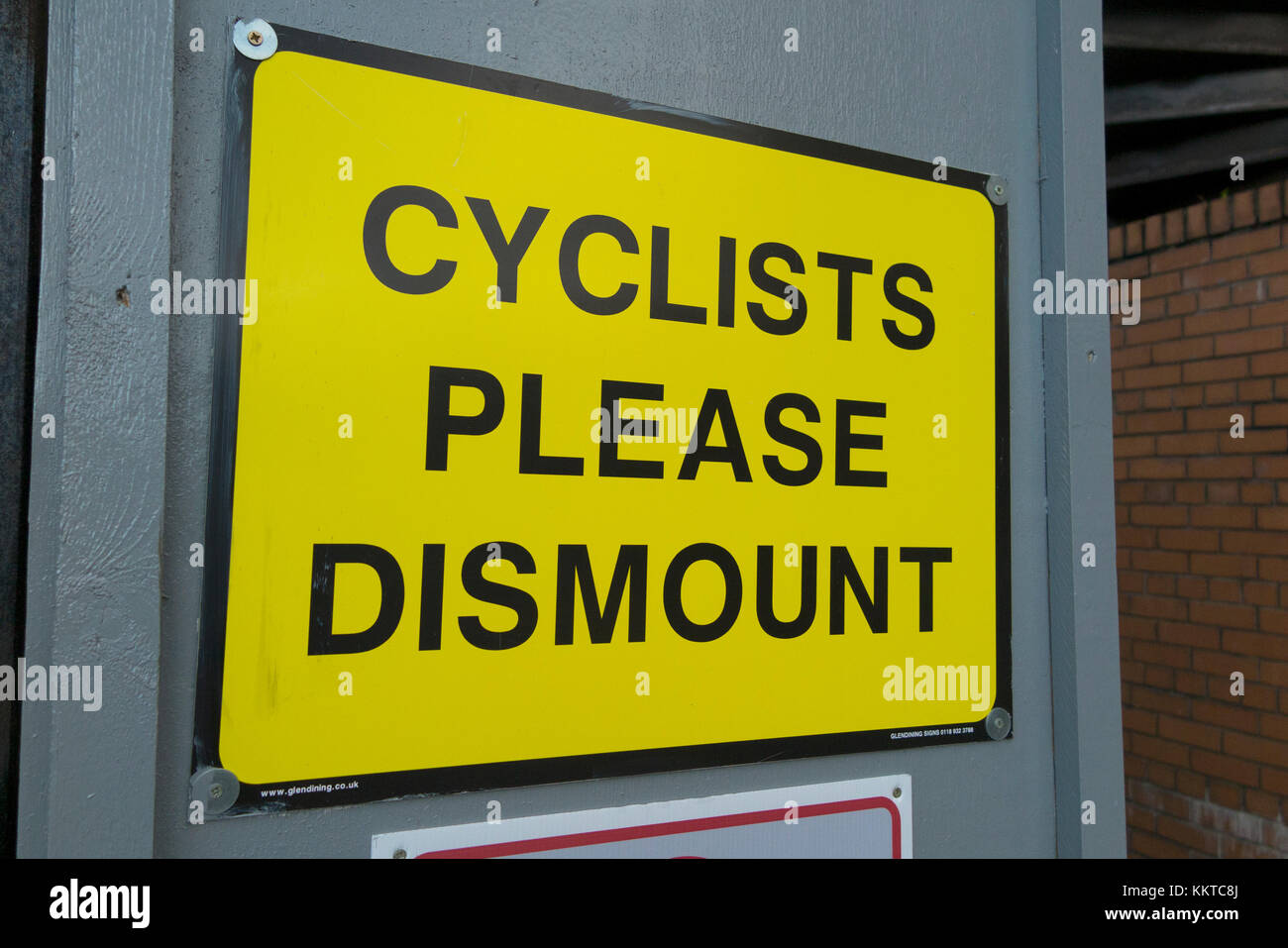 Cyclists cyclist dismount sign hi-res stock photography and images - Alamy