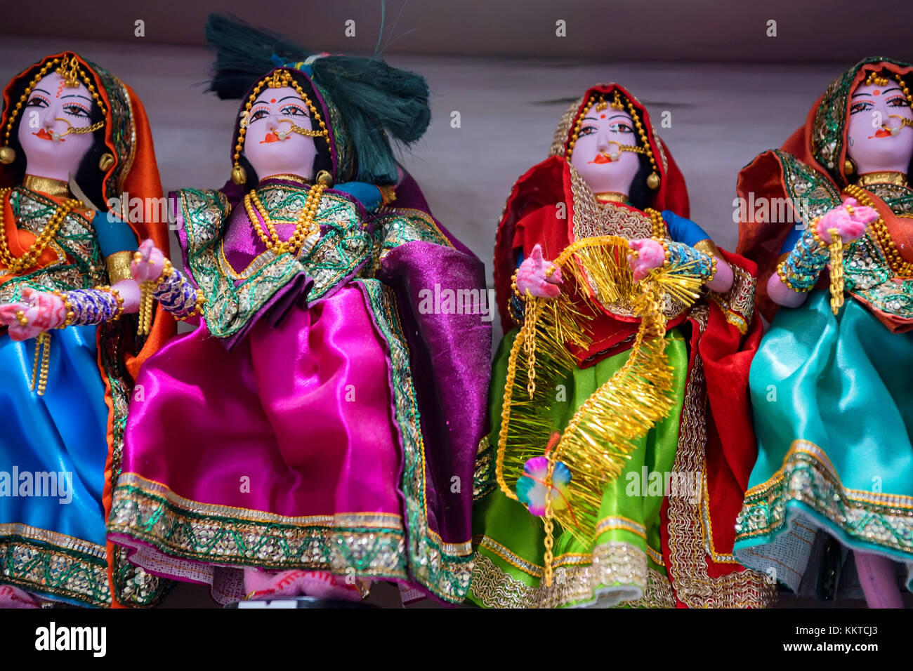 Three beautiful Indian dolls in traditional dress Stock Photo - Alamy