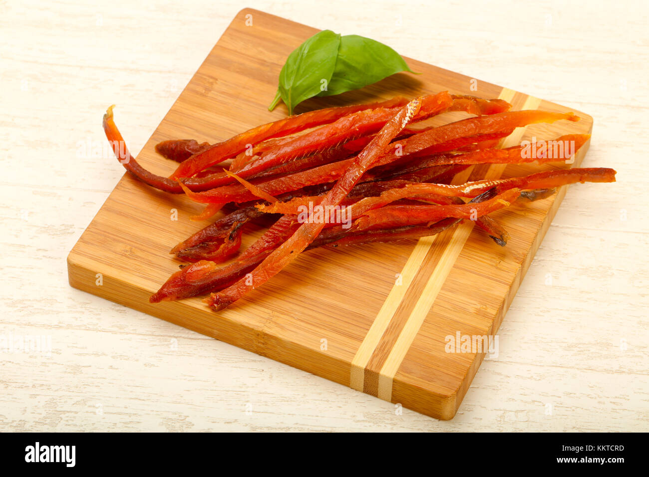 Salmon dry sticks snack Stock Photo - Alamy