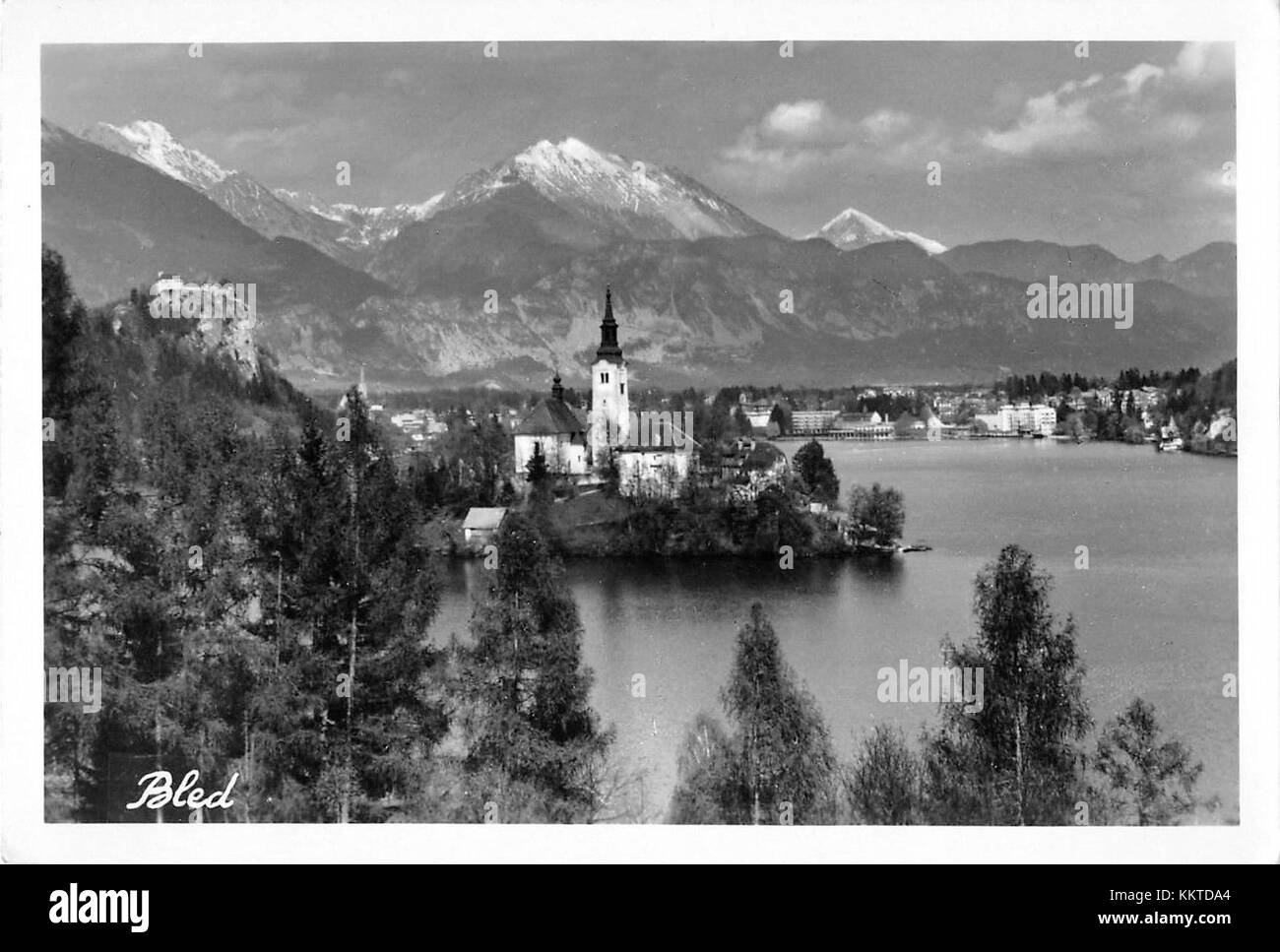 This vintage postcard depicts the scenic town of Bled, Slovenia. Known ...