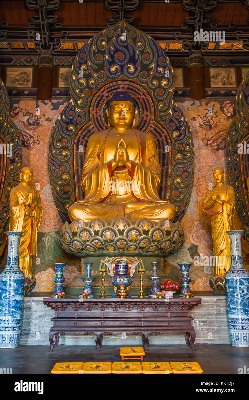 Giant golden Buddha statues housed in the Huayan Monastery Stock Photo ...