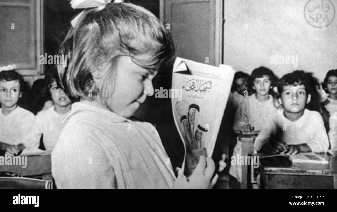 This image portrays a female classroom in Saudi Arabia, providing ...