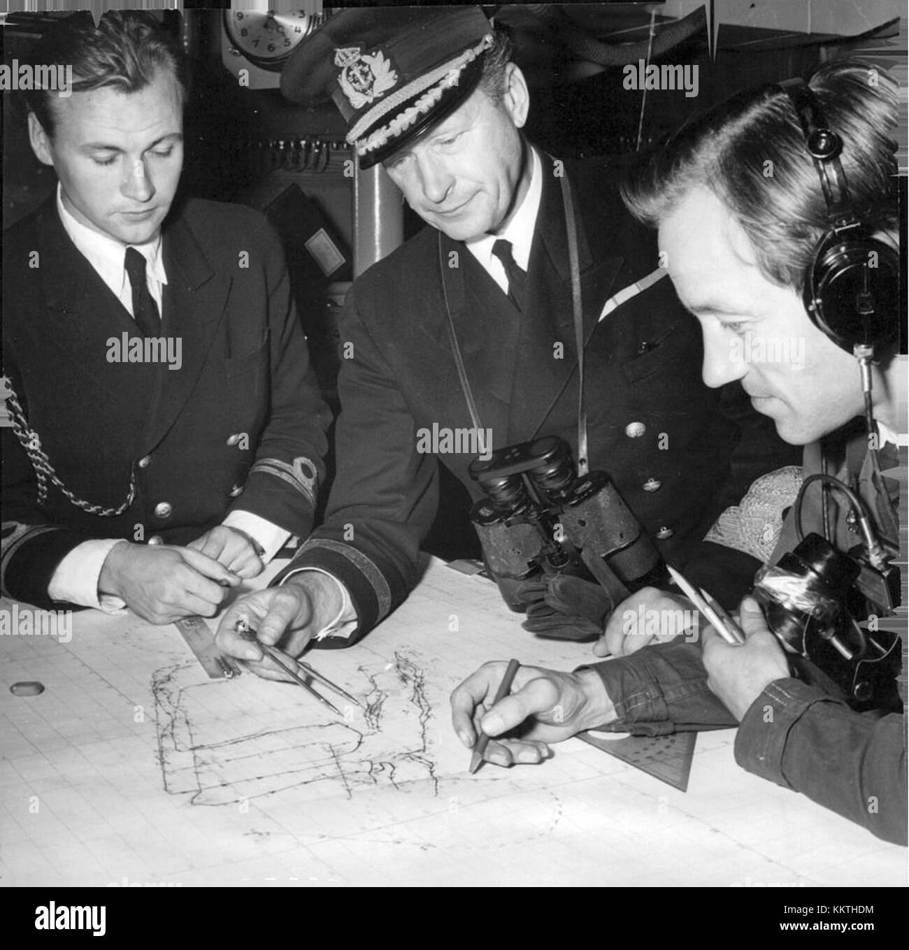 This photograph shows Admiral Erik af Klints with two of his aides ...