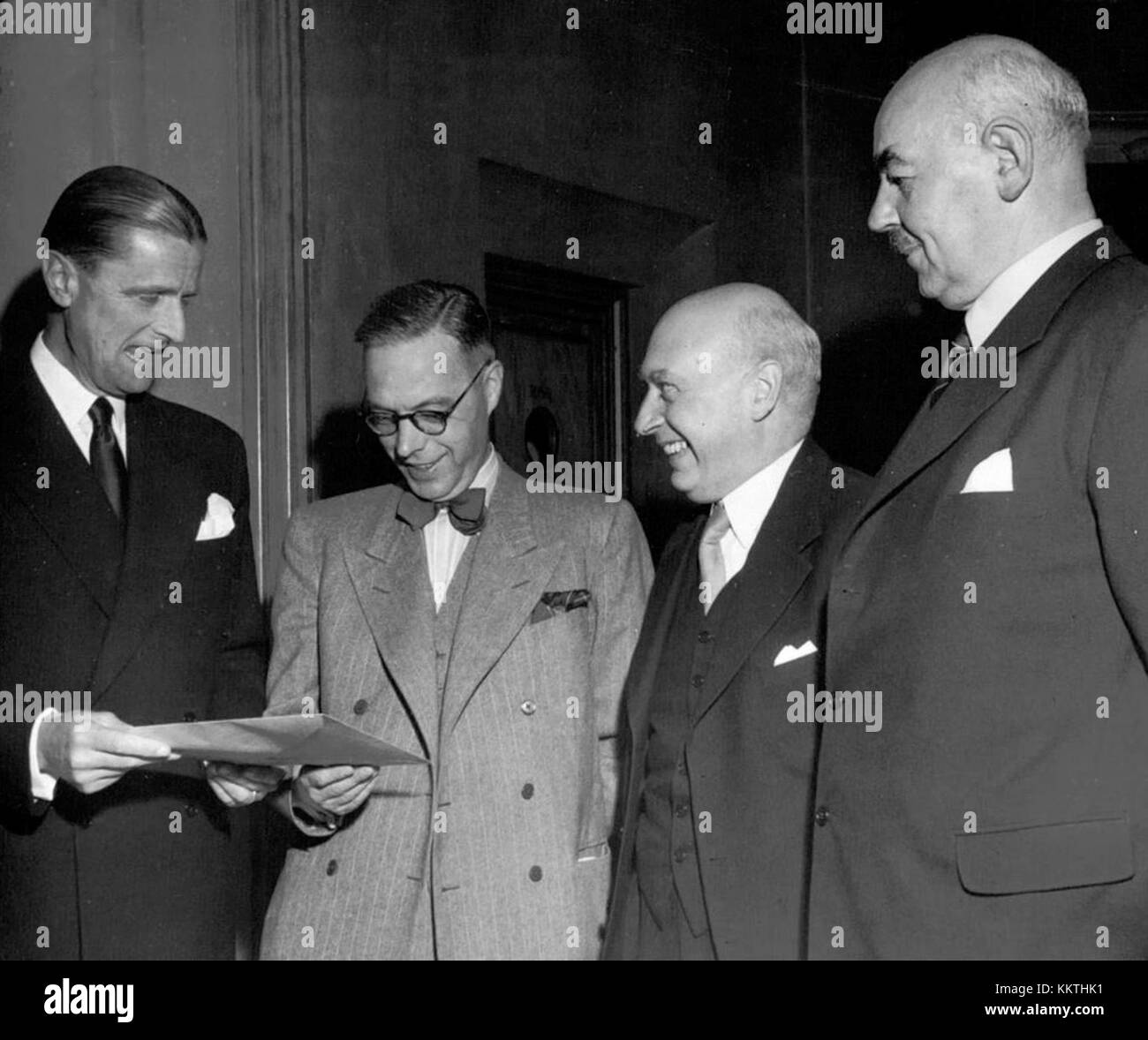 Delegates are seen engaging in a discussion at the Business Association ...