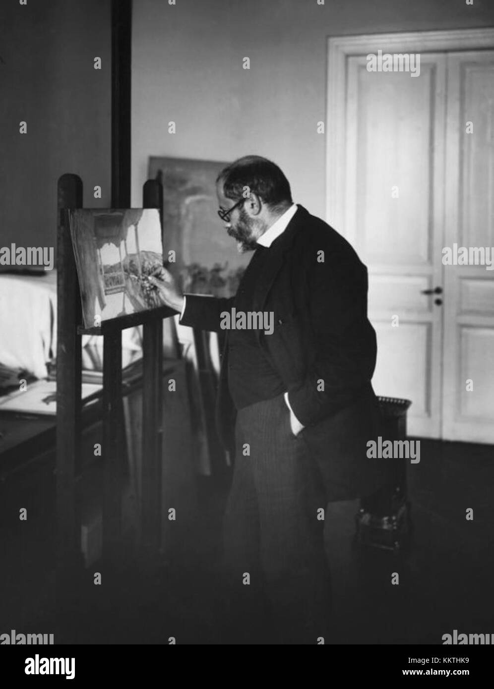 Alexander Benois, a prominent Russian artist, is depicted in his studio ...