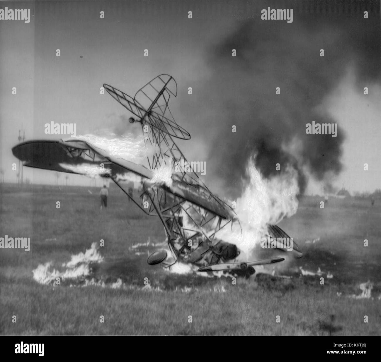 This photograph depicts the aftermath of a tragic plane crash ...