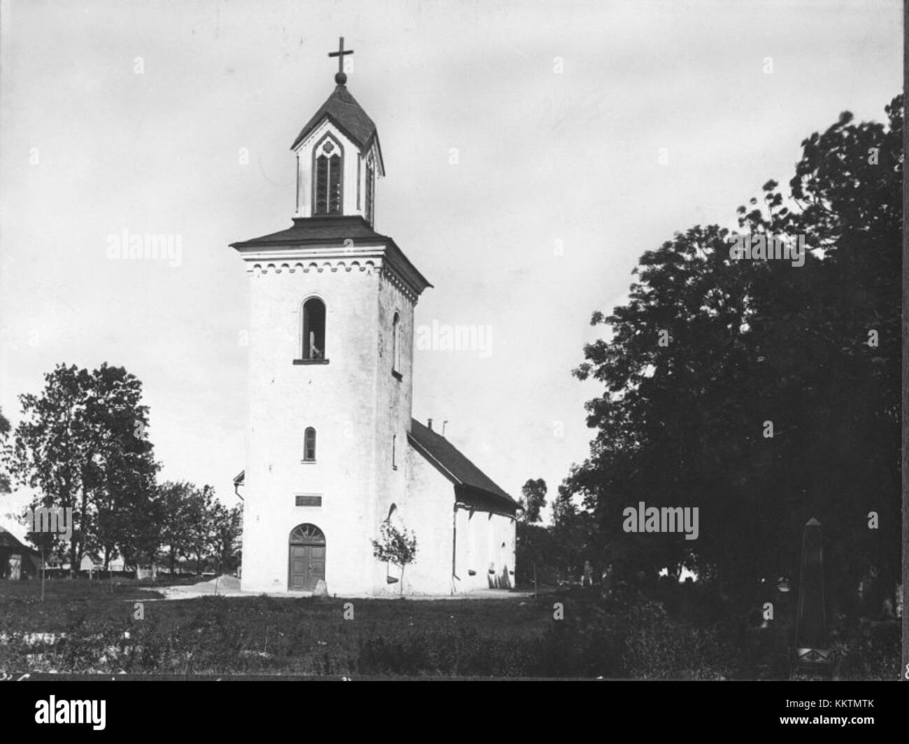 Photograph of Grinstad Church, a white-painted stone church located in ...