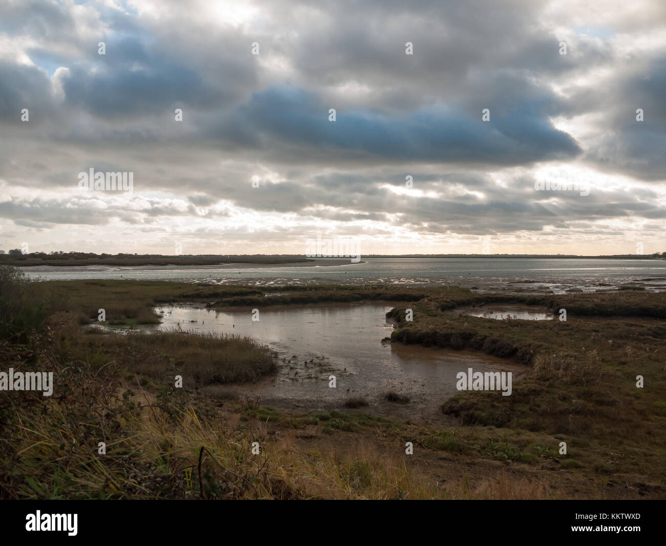 stunning dramatic cloud sky over estuary lake river ocean coastline ...