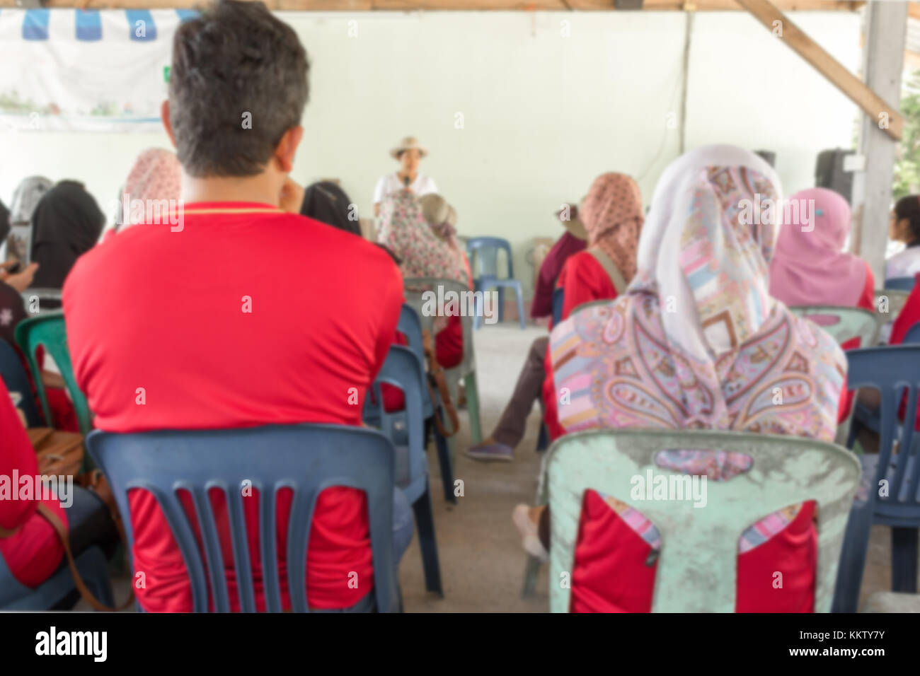 Blurred abstract background of university students sitting in a lecture ...