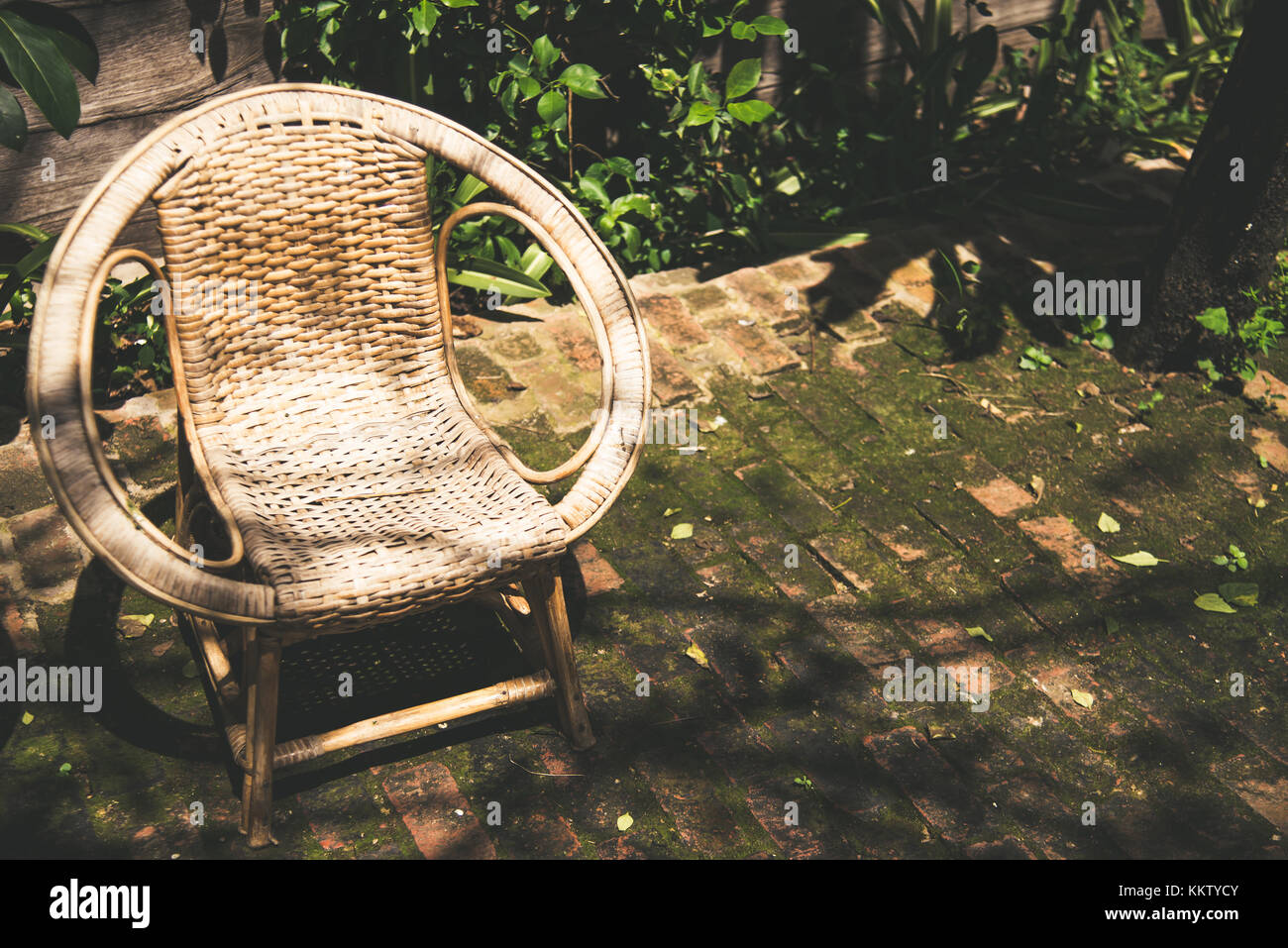 Classic rattan chair decorate in the outdoors garden Stock Photo - Alamy